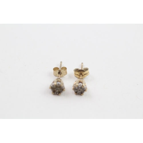 2x 9ct gold diamond stud earrings with scroll backs (1.4g)
