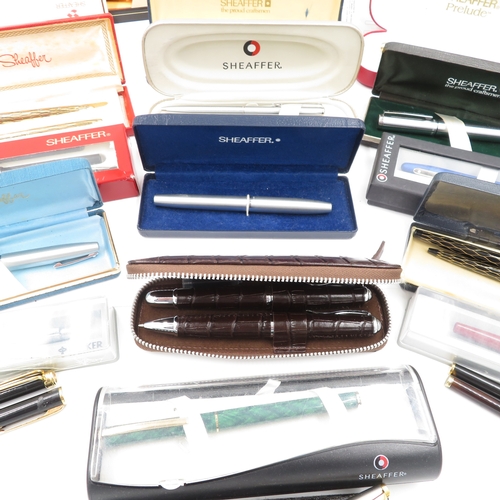 Assortment of boxed mixed untested pens including Sheaffer