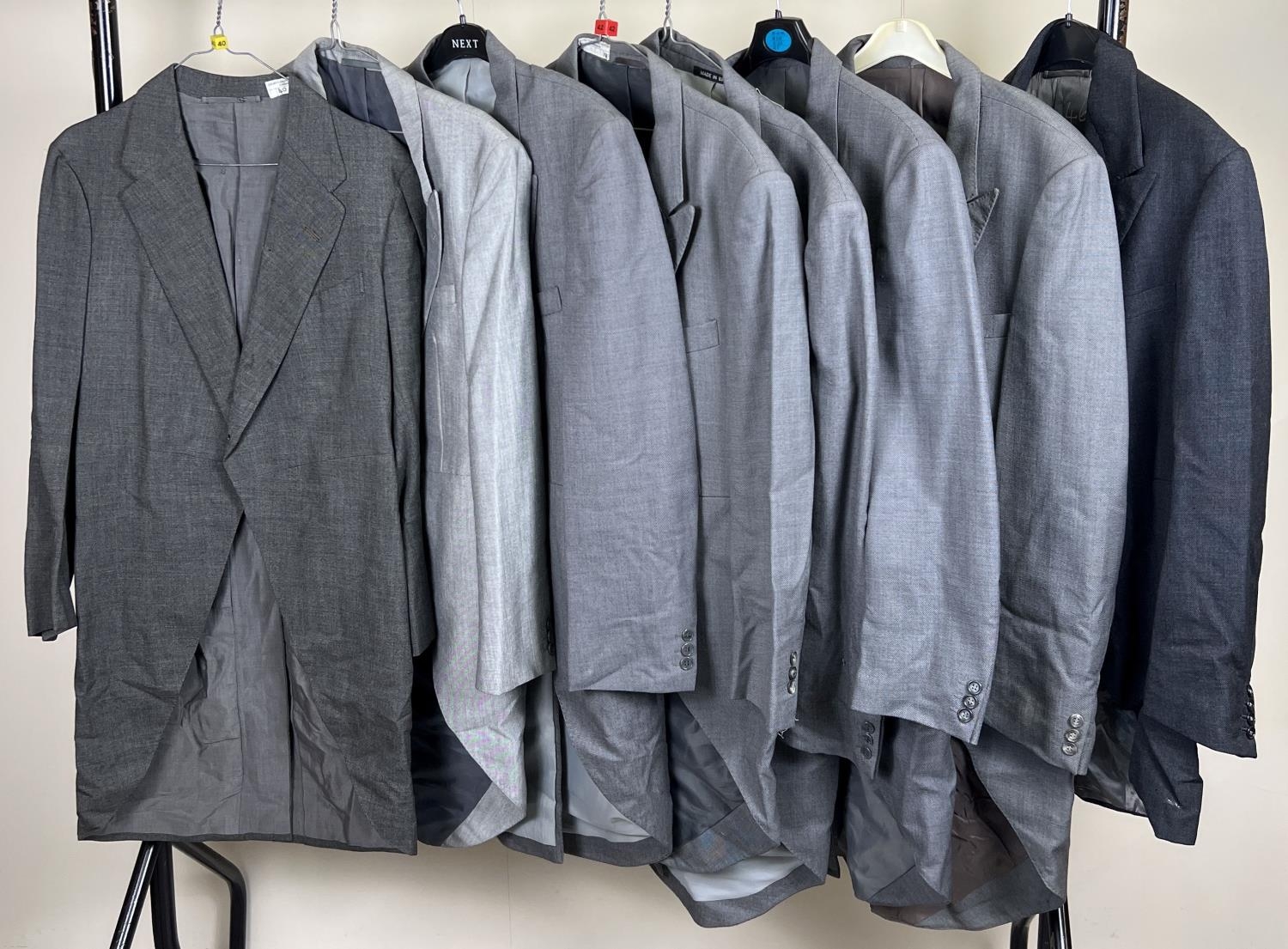 8 assorted men's vintage grey mourning coats. To include examples by ...