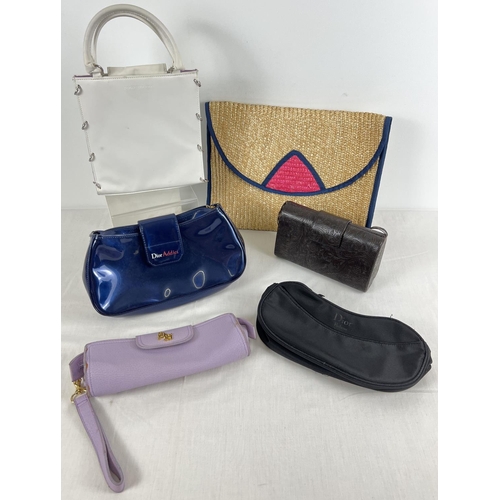 6 perfume associated handbags. To include clutch bags and grab bags ...