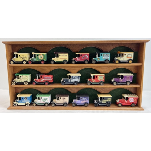 A wooden wall hanging display shelf unit for model cars, together with ...