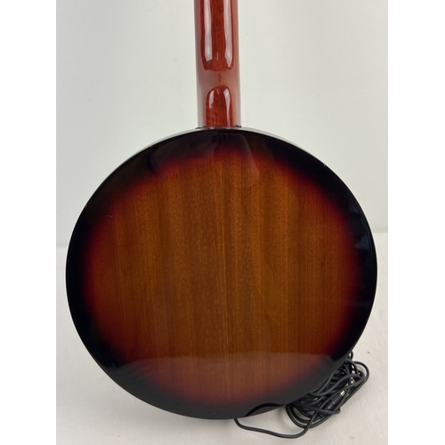 A Martin Smith 5 string hi gloss wooden cased banjo with pickup and ...