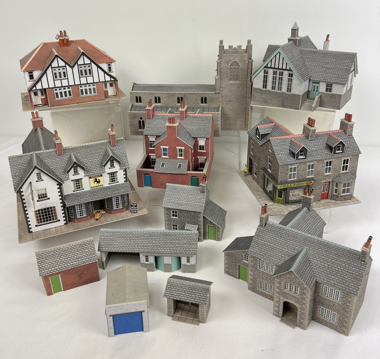 A box of assorted houses and buildings, suitable for model railways ...