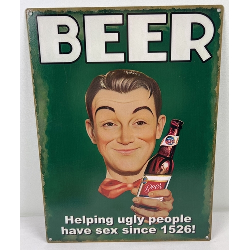 A modern printed tin vintage design humorous sign. With holes for wall ...