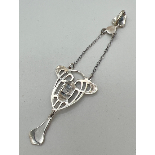 A modern silver necklace pendant of Art Nouveau design with enamelled ...