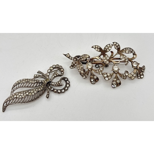 2 vintage brooches. A German silver bow brooch set with marcasites ...