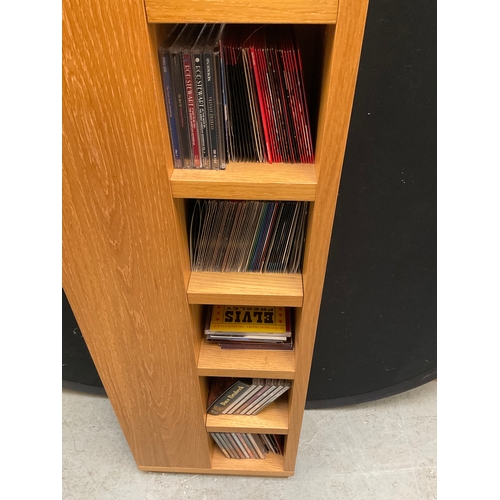 MODERN OAK TALL AND NARROW CD SHELVES TO INCLUDE A QTY OF MUSIC CD,S ...