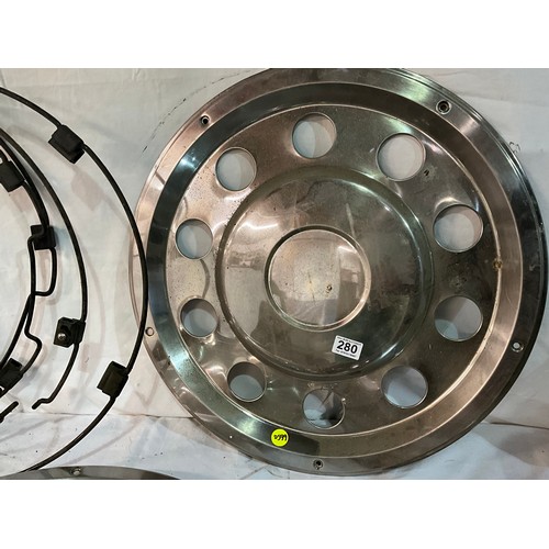 A SET OF 4 CHROME LORRY WHEEL TRIMS