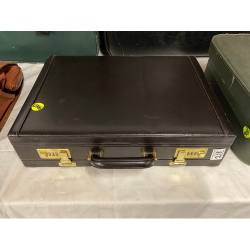QTY OF SUIT CASES ETC