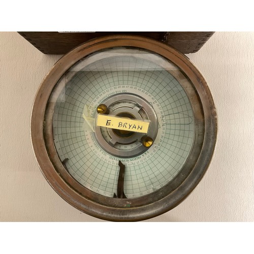 A VINTAGE OAK CASED PIGEON CLOCK
