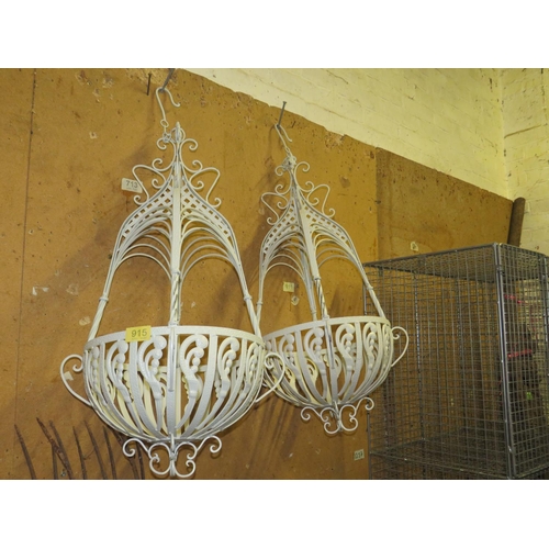 2 wrought iron baskets
