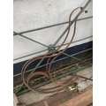 Two wrought iron frames for a rocking bench