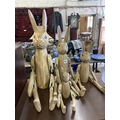 Family of four wooden jointed rabbits