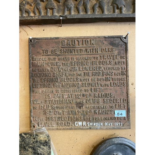 Cast iron caution sign