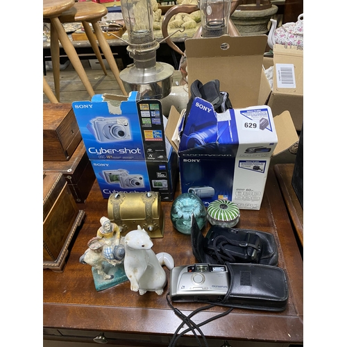 Cameras, paperweights etc