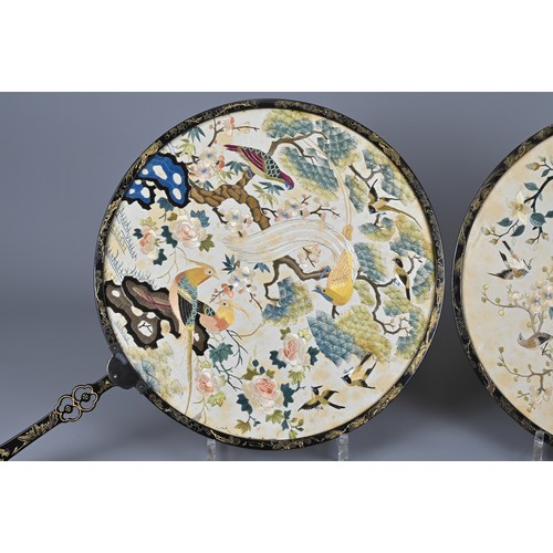 A PAIR OF CHINESE SILK EMBROIDERED LACQUER FANS, QING DYNASTY. Of ...
