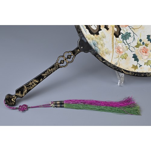A PAIR OF CHINESE SILK EMBROIDERED LACQUER FANS, QING DYNASTY. Of ...