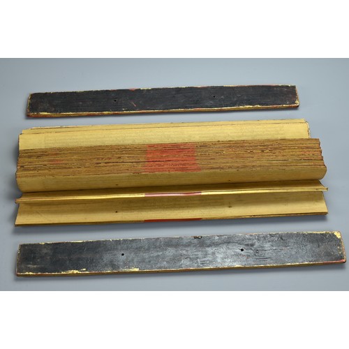 A BURMESE PALM LEAF MANUSCRIPT WITH COVERS, LATE 18TH CENTURY. Red ...