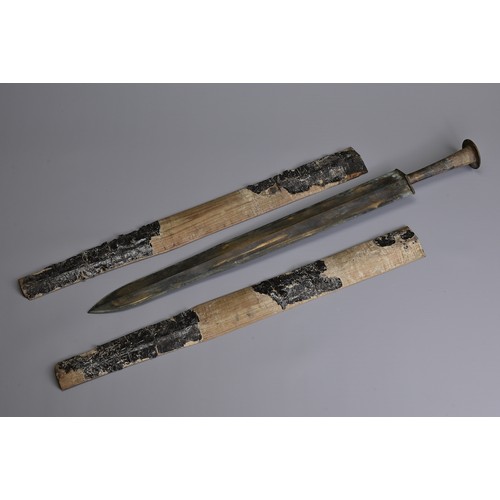 A RARE CHINESE BRONZE SWORD WITH BLACK LACQUERED SCABBARD, WARRING ...