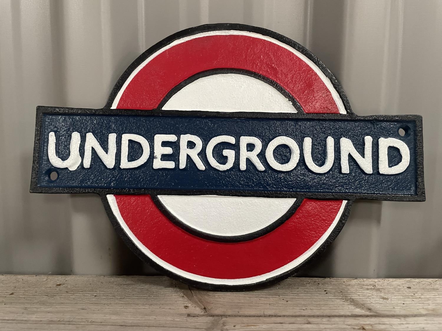 CAST IRON UNDERGROUND SIGN