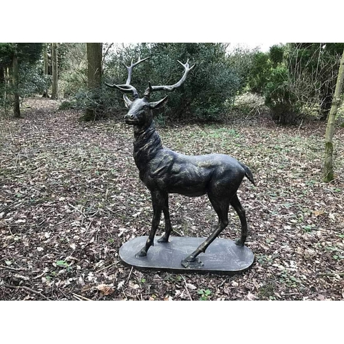 LARGE CAST IRON STAG STANDNG ON PLINTH