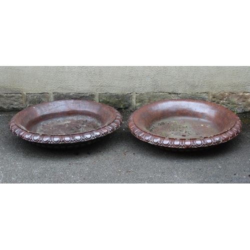 A PAIR OF LARGE SALT GLAZED POTTERY FOUNTAIN TRAYS of shallow circular ...