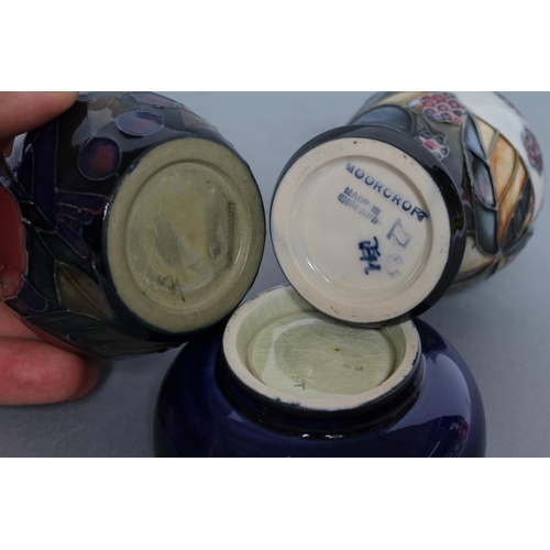 TWO MOORCROFT POTTERY SMALL VASES, 20th century, comprising a Bramble ...