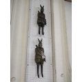 TWO WOODEN WALL HANGING HARES