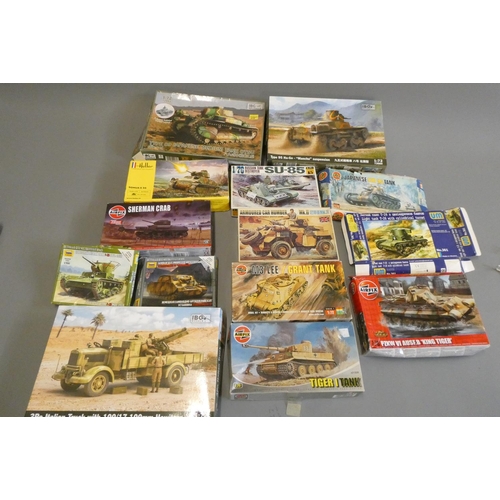 Fourteen plastic construction kits of tanks and armoured vehicles by ...