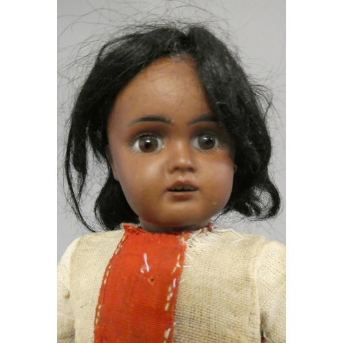 A bisque socket head doll, possibly Bahr & Proschild, with brown glass ...