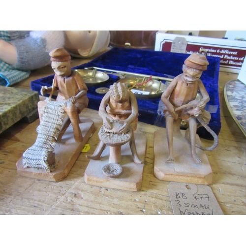 THREE SMALL WOODEN FIGURES