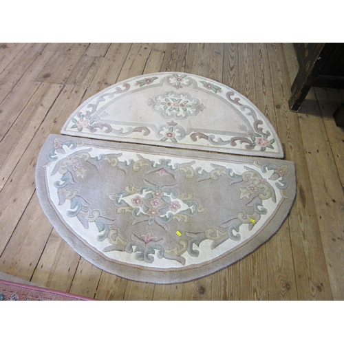 PAIR OF HALF MOON RUGS