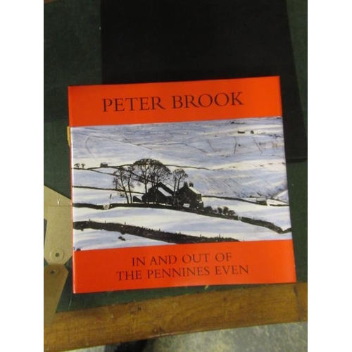 CASED COPY OF PETER BROOK BOOKS "IN AND OUT OF THE PENNINES"
