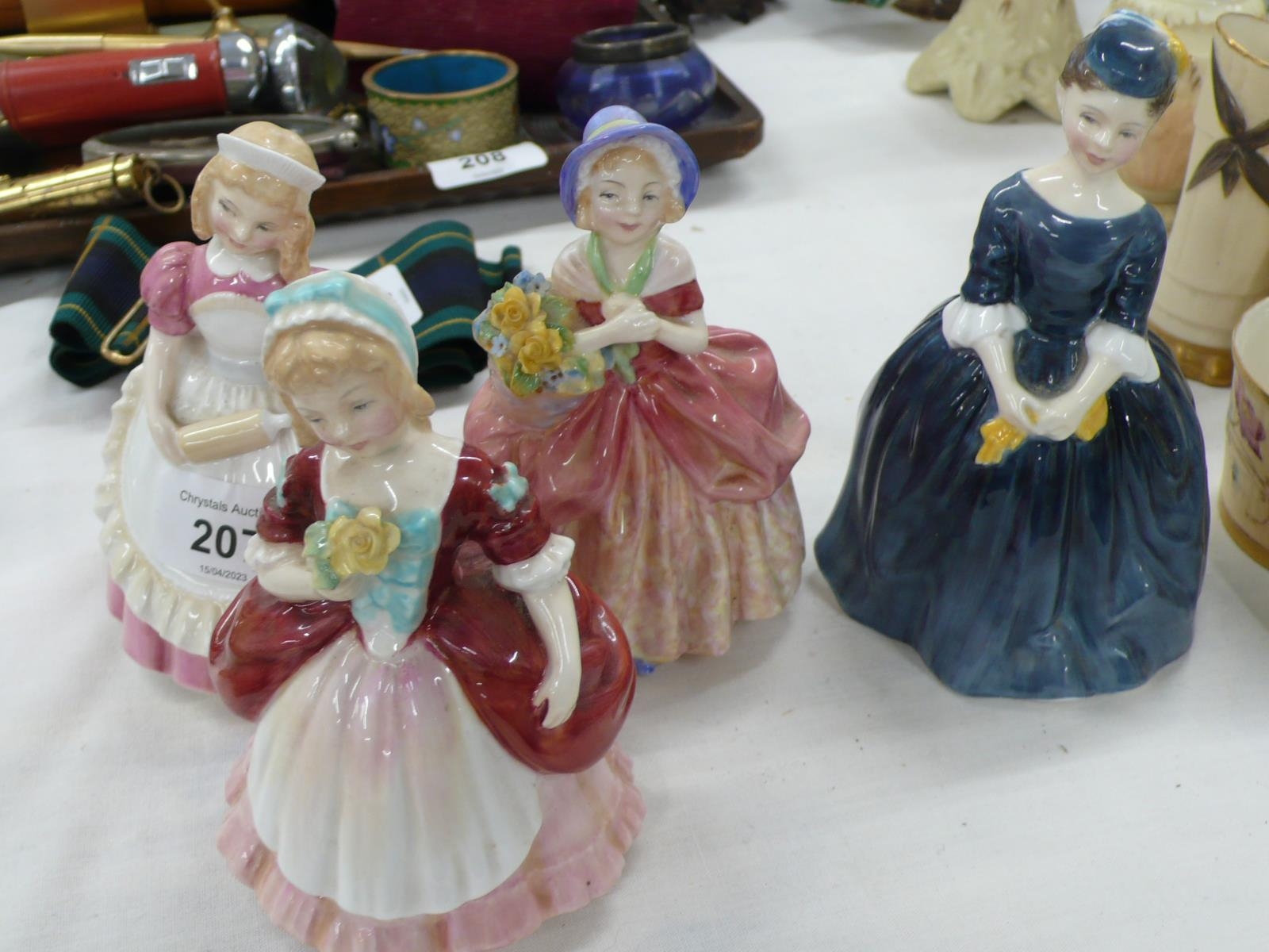 Four small Royal Doulton figurines - Cookie, Valerie, Cherrie and Cissie