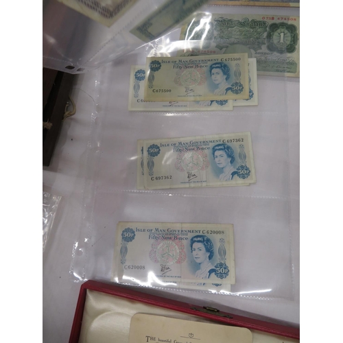 A collection of Isle of Man £1 and 50p notes