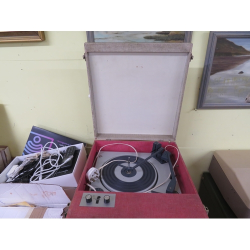 Three portable record players, two with built-in speakers