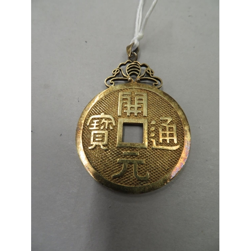 Chinese silver gilt pendant coin
