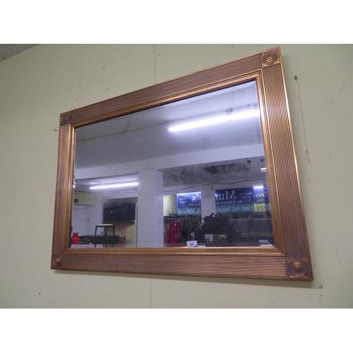 Rectangular gilt framed, bevel edged glass wall mirror