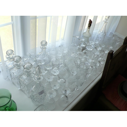 Large collection of glassware on window sill