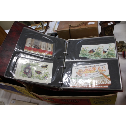 Seventeen stamp albums containing Chanel Island Stamps - mint and franked