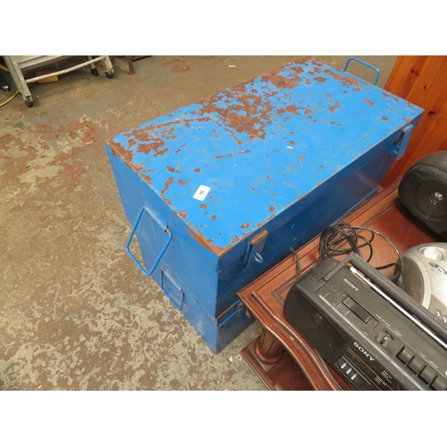 Two metal tool trunks