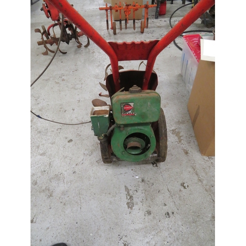 Garden master rotavator plus a plough attachment