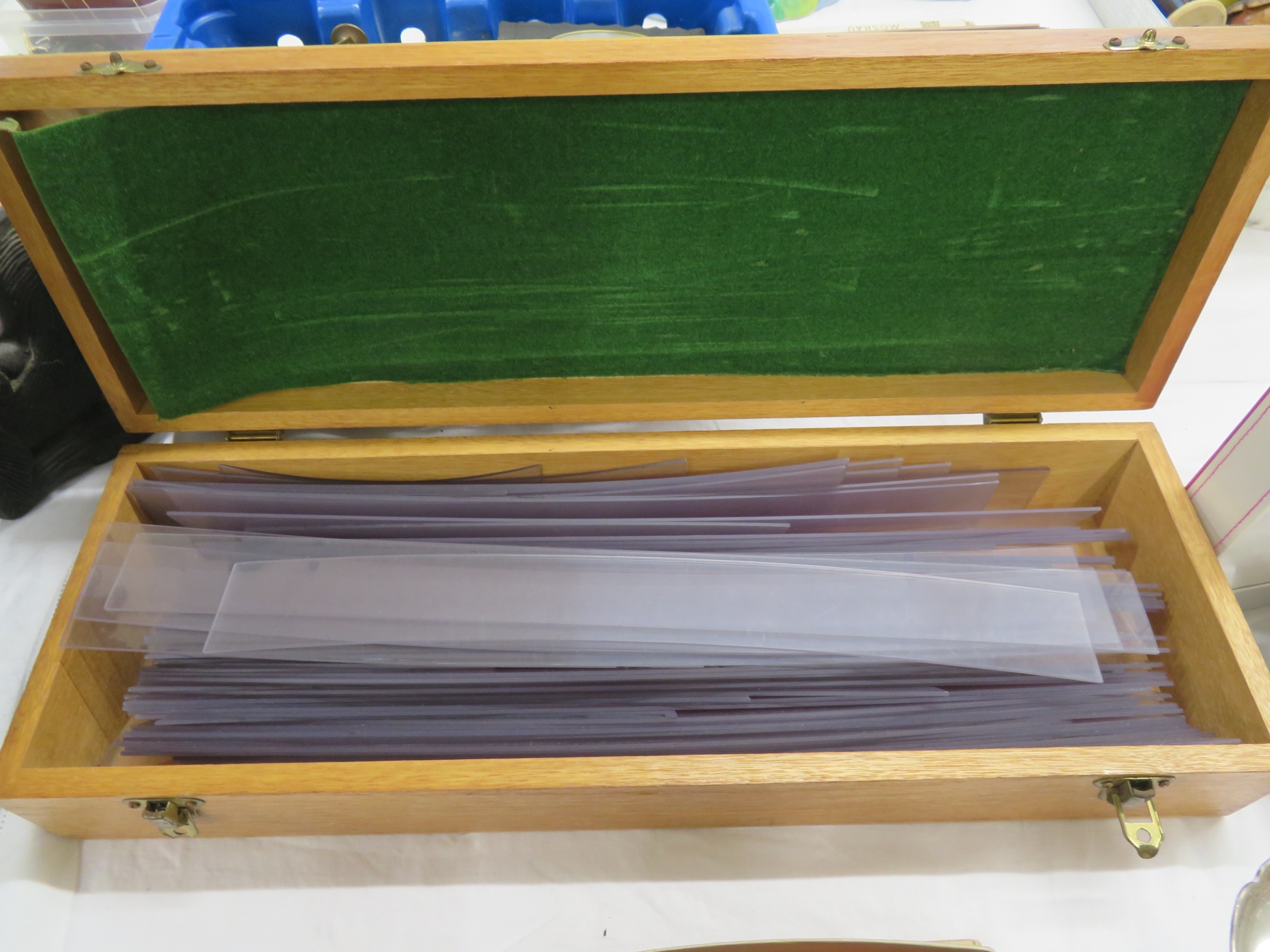 A box containing perspex lengths for shapes