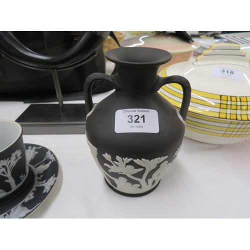 A black basalt ware wedgwood two handled urn with classical figure ...