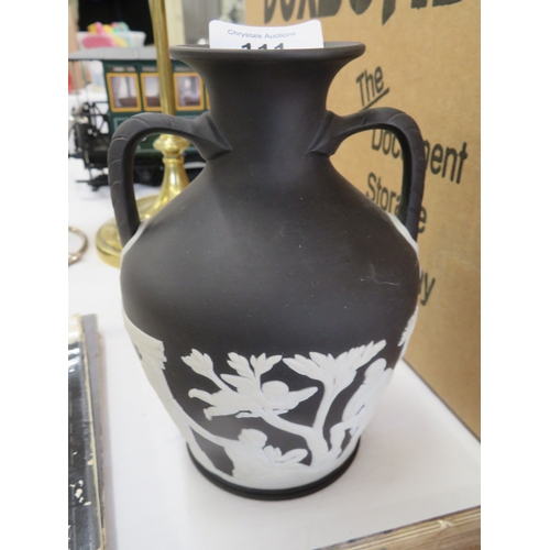 A black basalt ware wedgwood two handled urn with classical figure ...