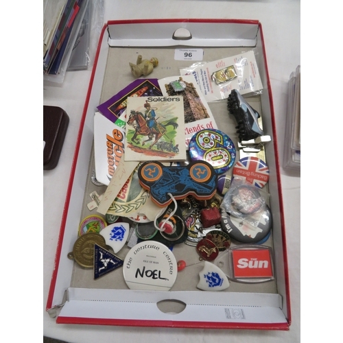 A collection of badges including TT 1965