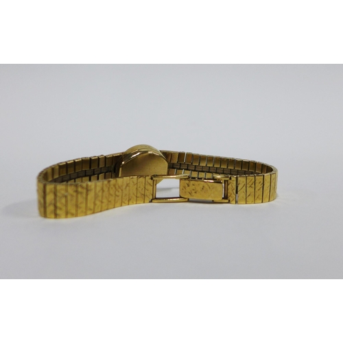 Lady's Jean Renet 9ct gold wrist watch on a textured 9ct gold strap