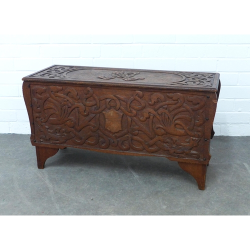 Manner of Alexander Ritchie, an early 20th century oak carved coffer ...