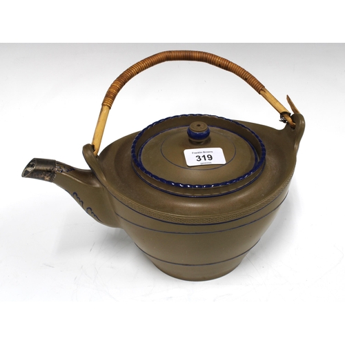 Wilson brown drab ware teapot, with wicker loop handle broken at one ...