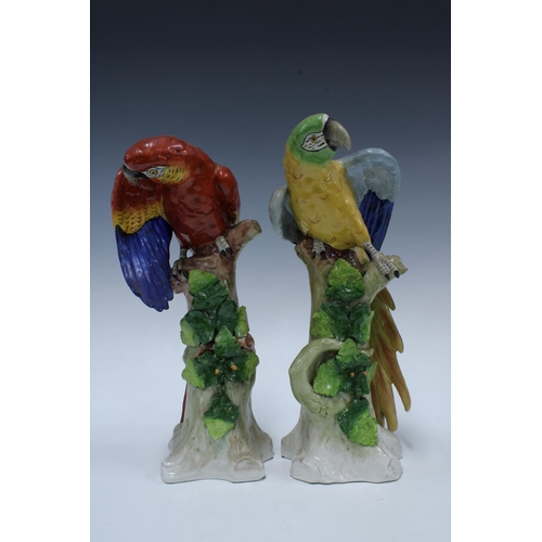 Two Sitzendorf parrots, taller 31cm, together with a blue and white ...